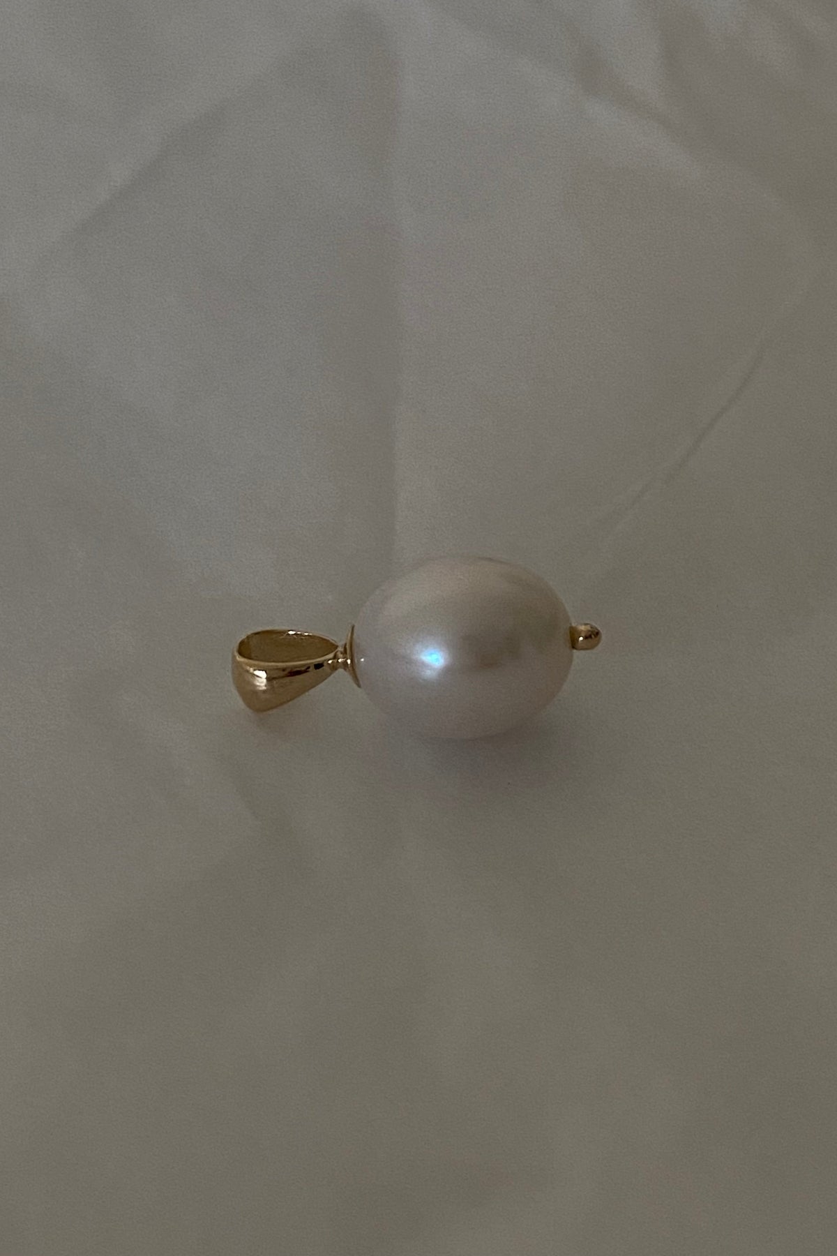 puff pearl charm– CCNY